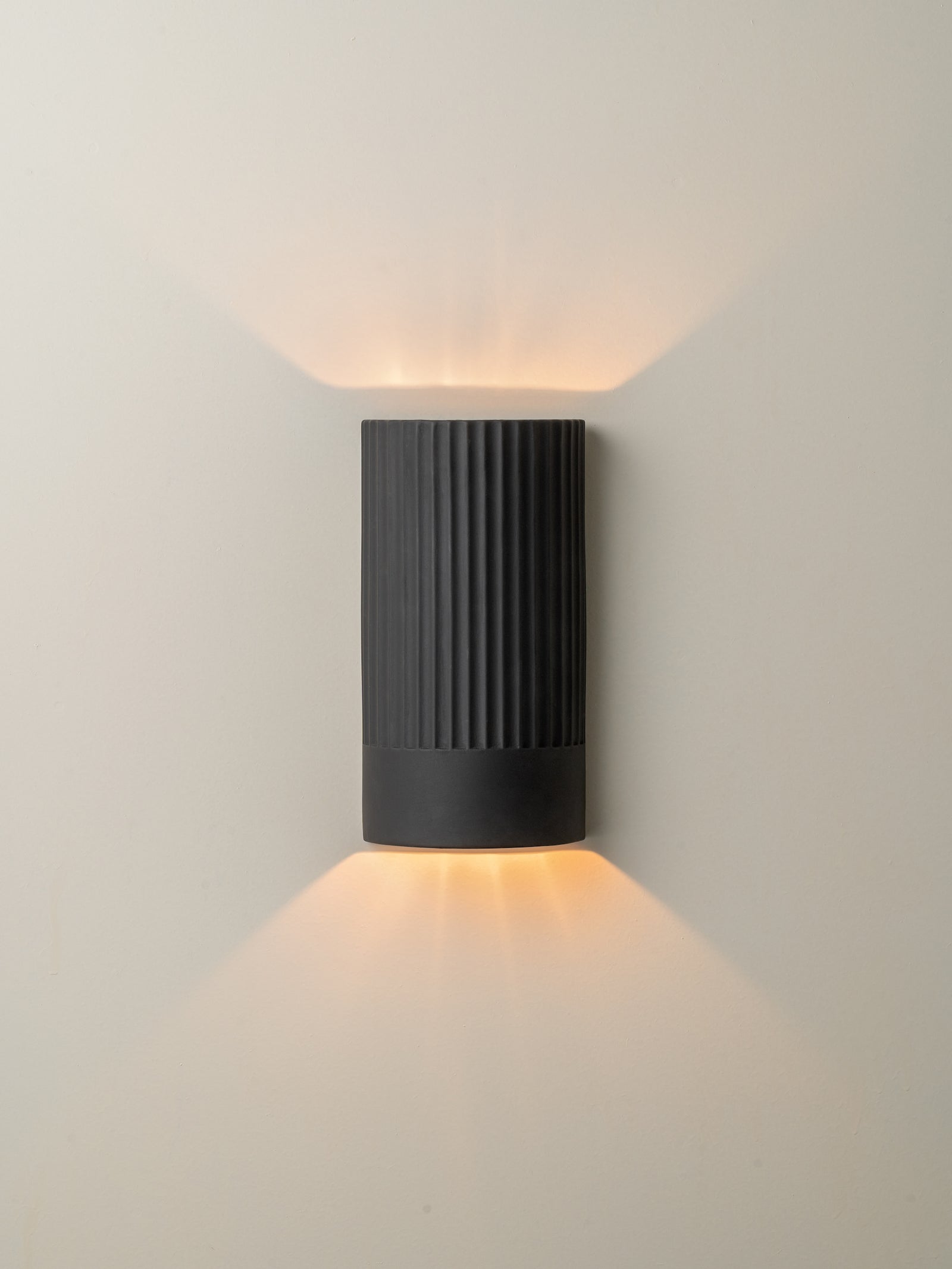 Nitara - chocolate ribbed concrete wall light