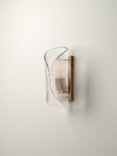 Cannoli - aged brass and textured glass wall light