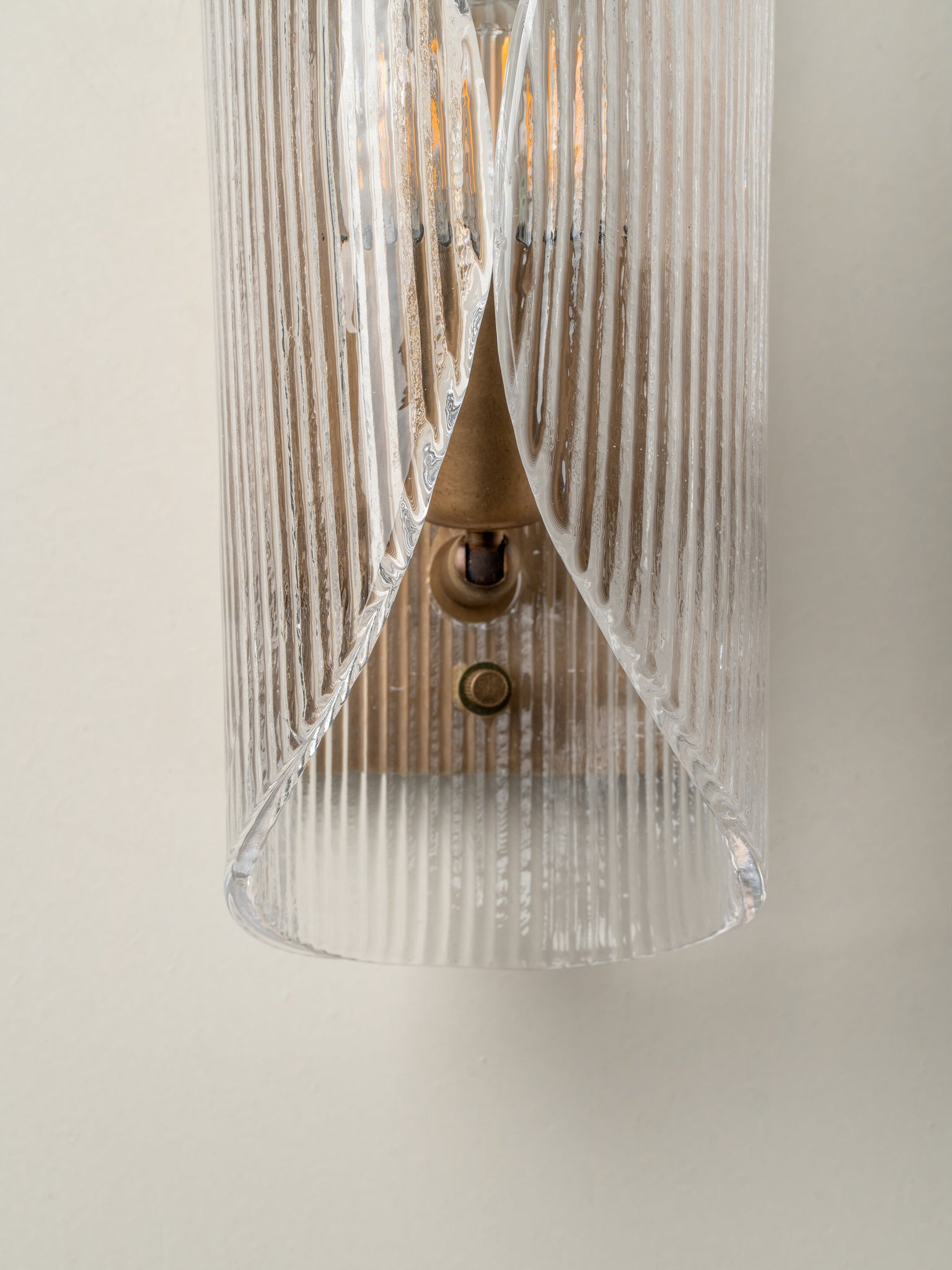 Cannoli - aged brass and textured glass wall light