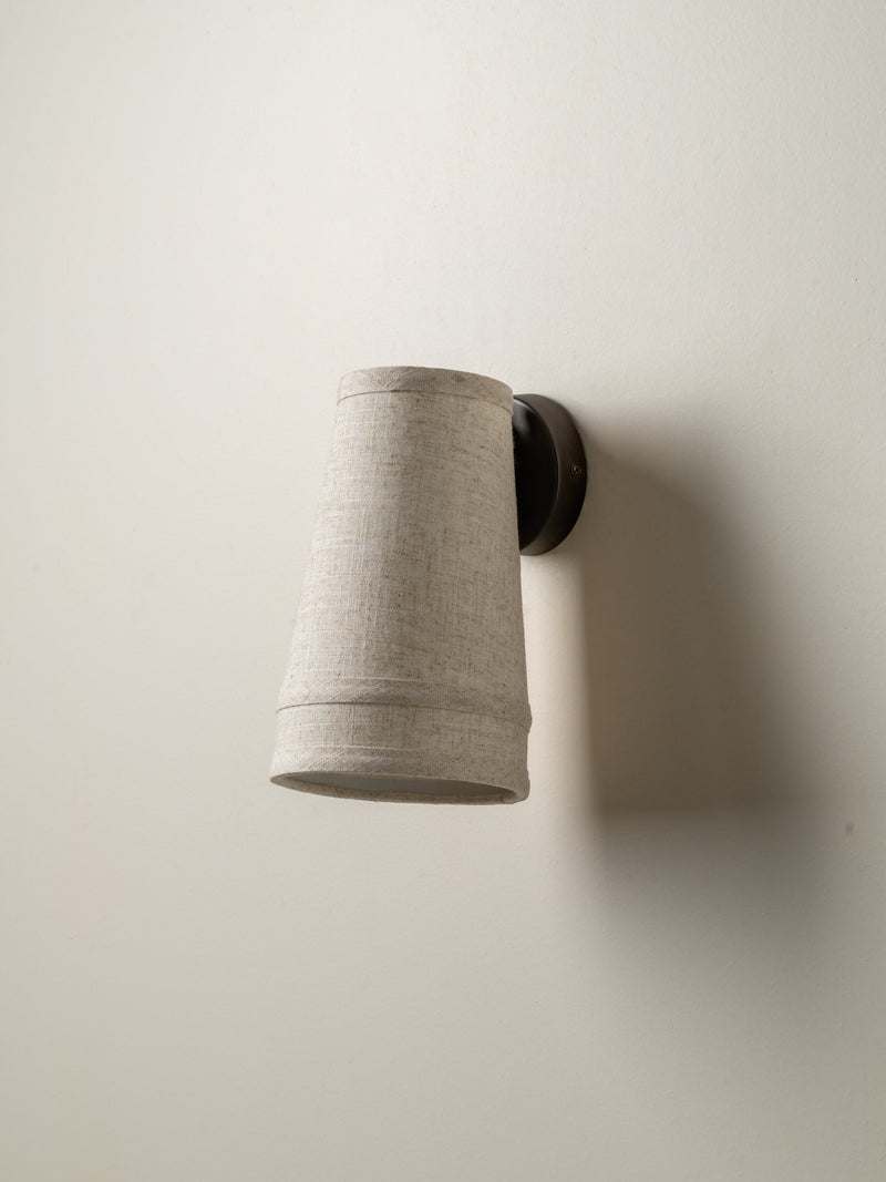 Solara - bronze and layered natural linen wall light